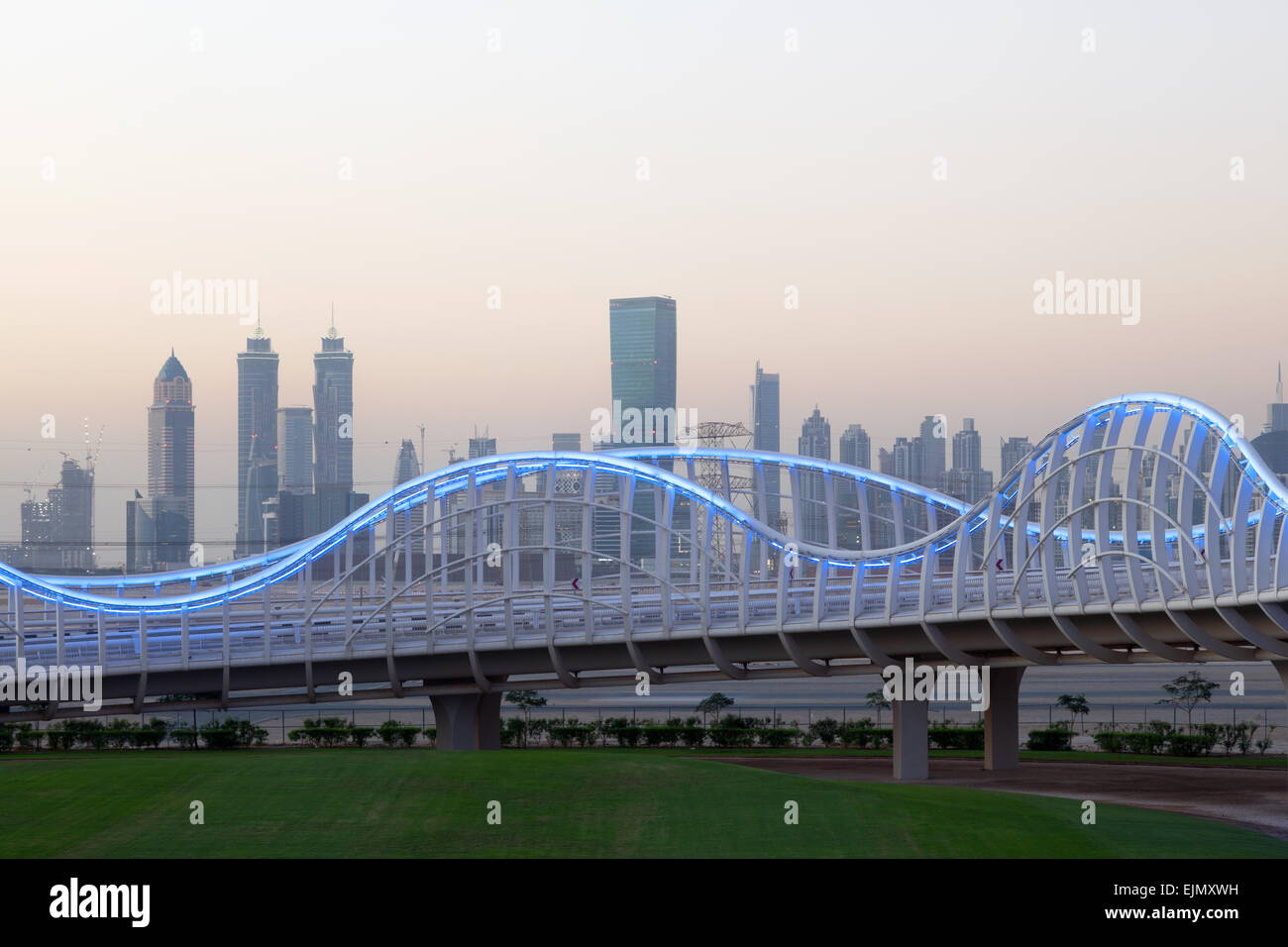 Wave shaped Meydan Bridge in Dubai illuminated at night. December 13 ...