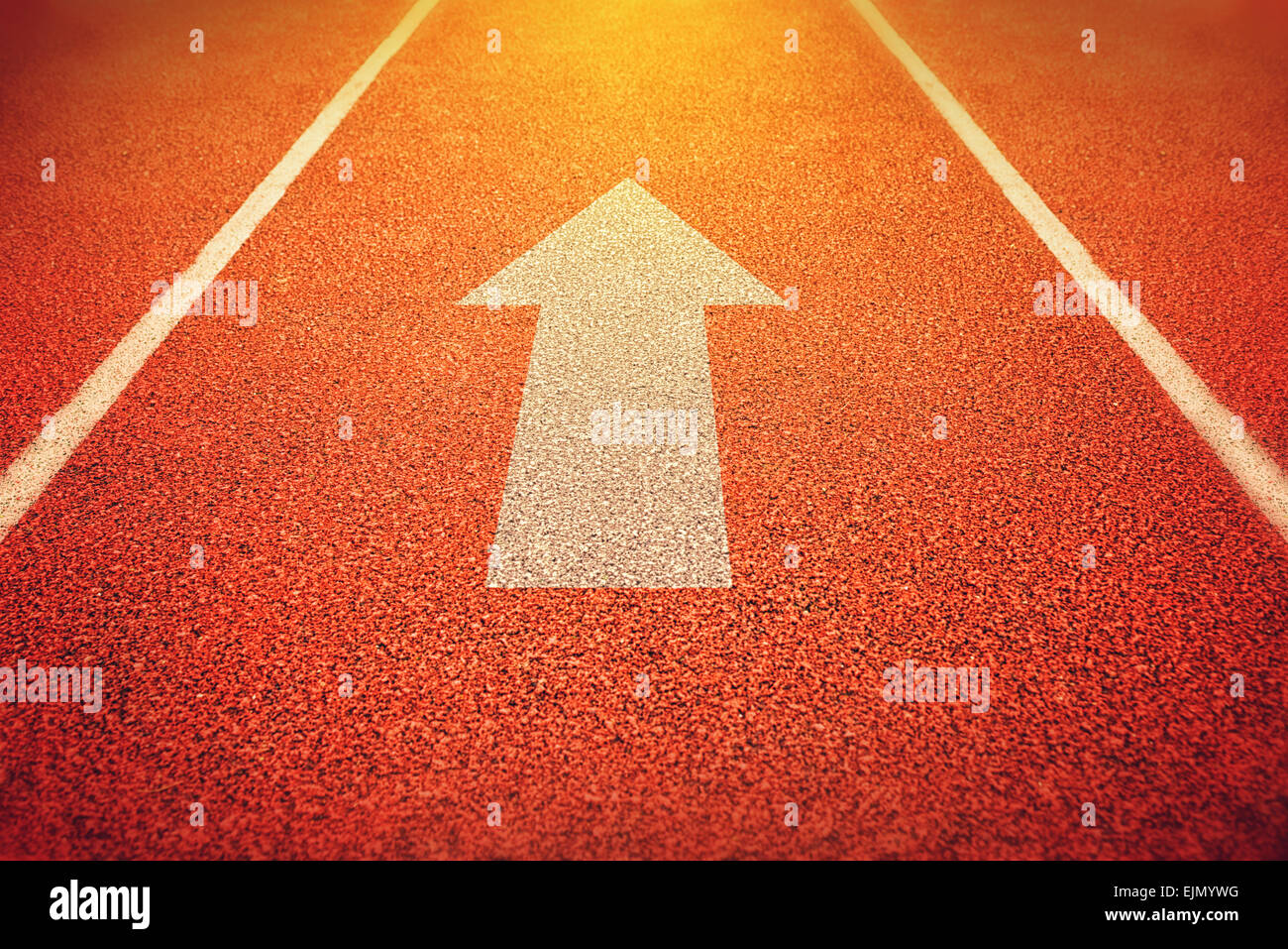 Athlete Running Track with an Arrow Pointing Forward as Motivation and ...
