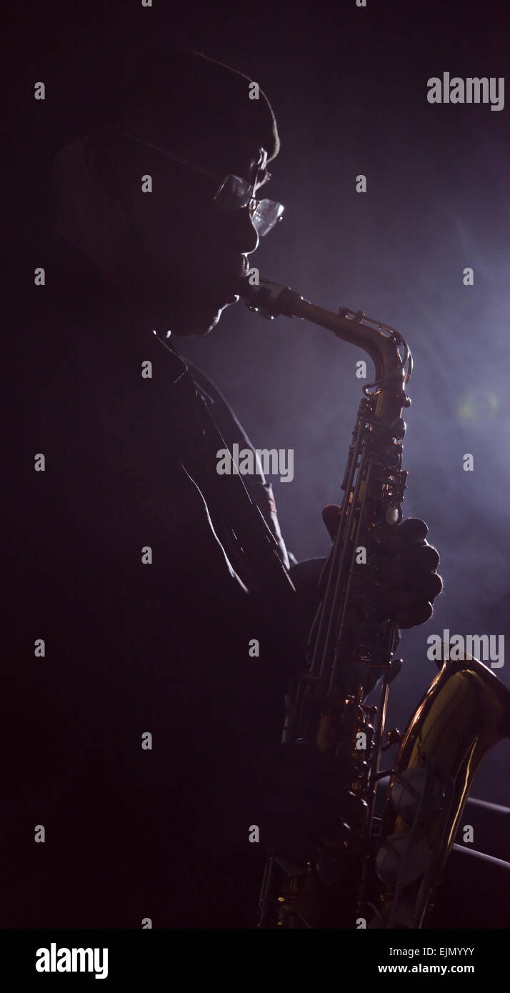 African jazz musician playing the saxophone Stock Photo - Alamy