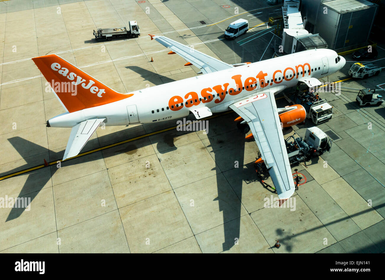 Easyjet aeroplane being serviced on the apron at Gatwick airport, north ...