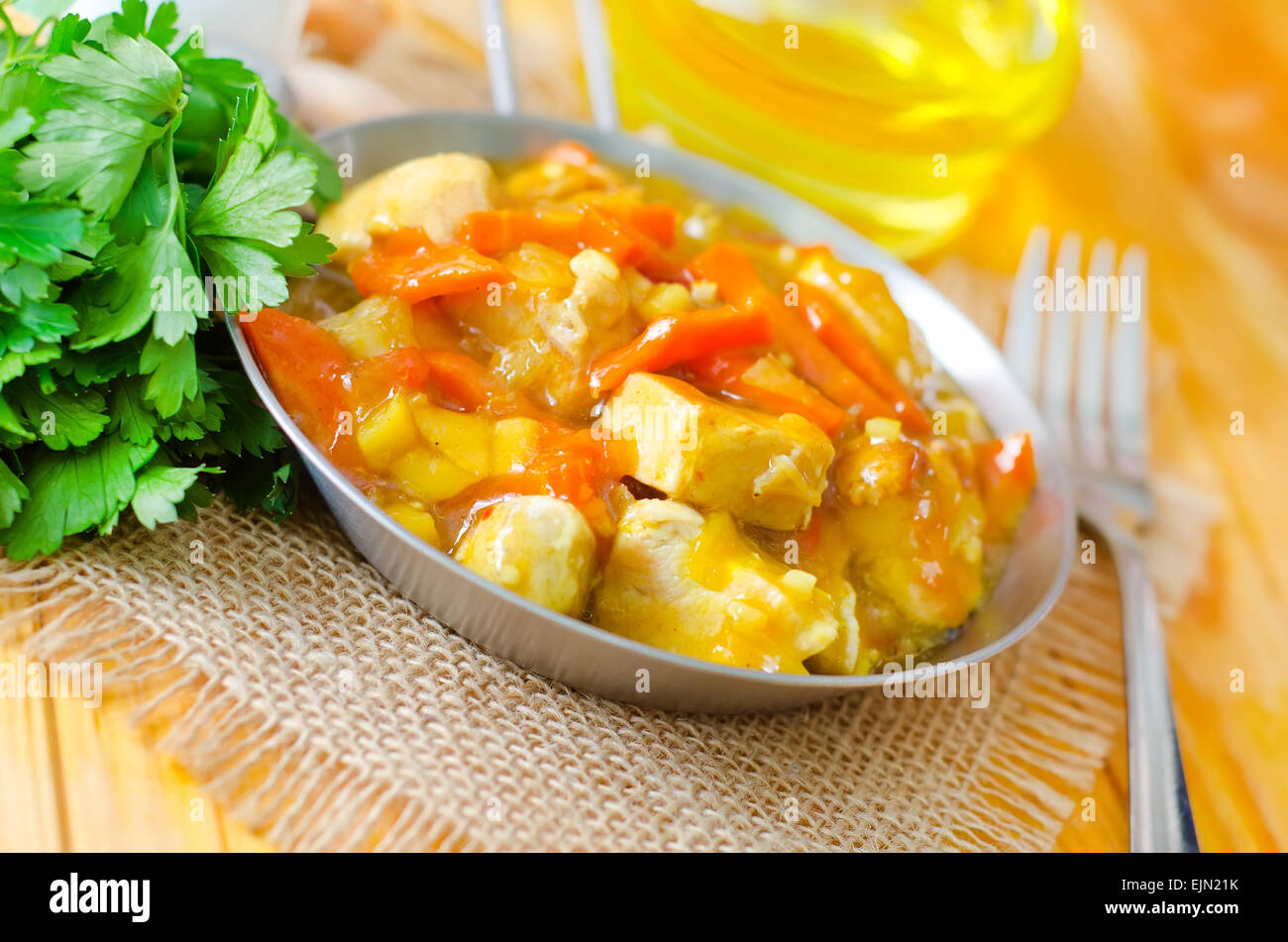 chicken with vegetable in metal plate Stock Photo - Alamy