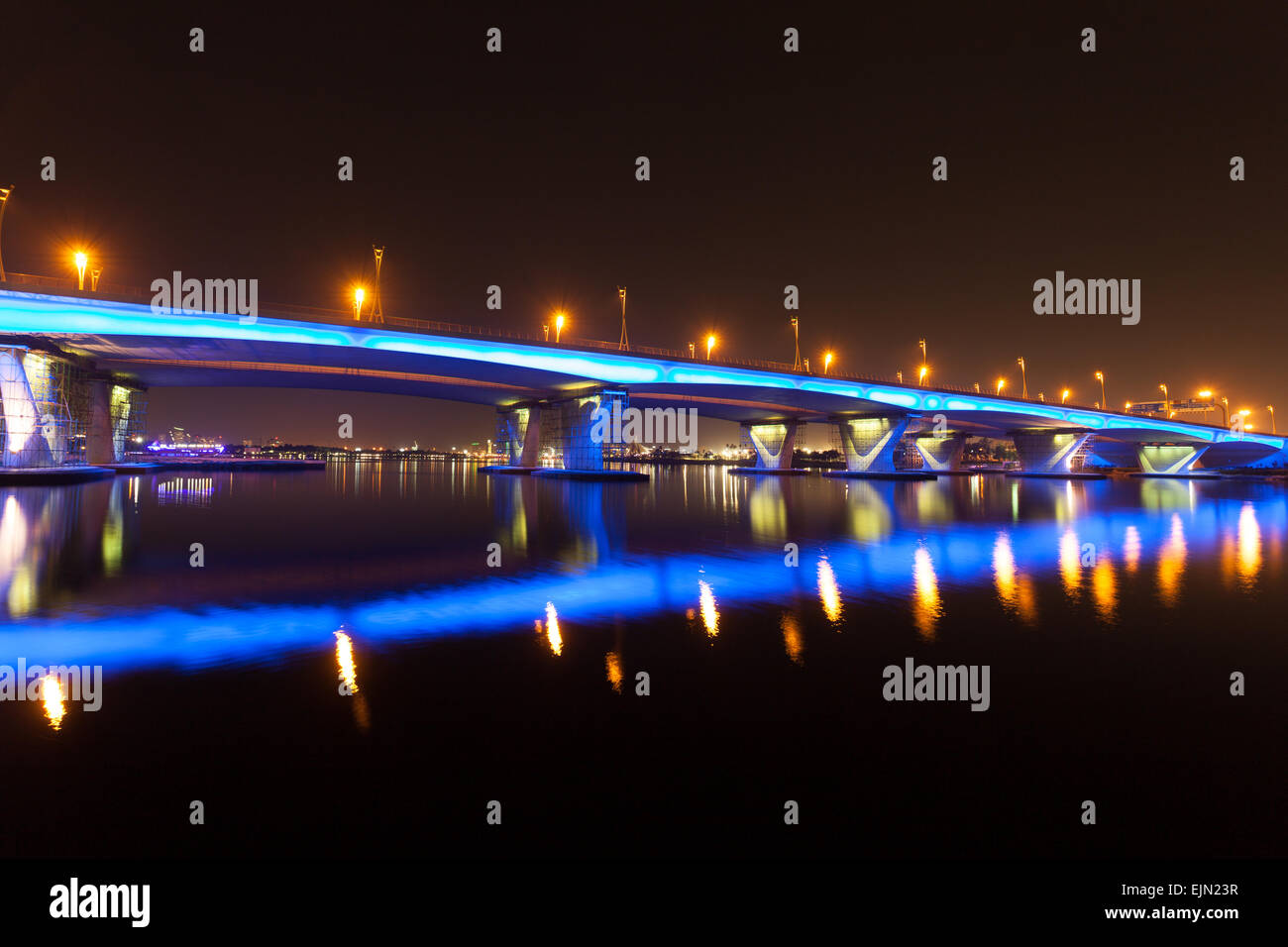 Blue illuminated Al Garhoud Bridge in Dubai, United Arab Emirates Stock ...