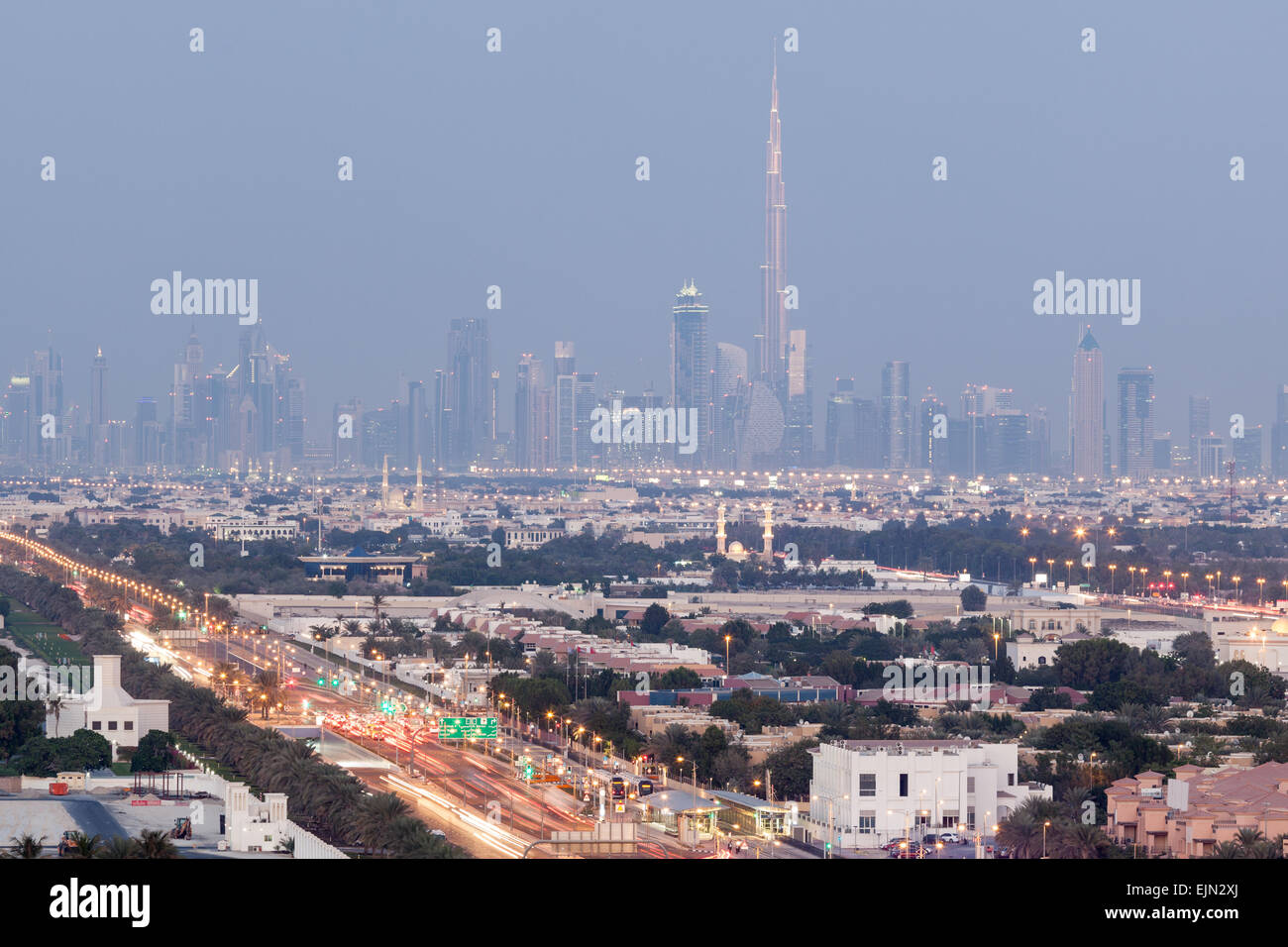 Skyline of Dubai illuminated at night, United Arab Emirates Stock Photo ...