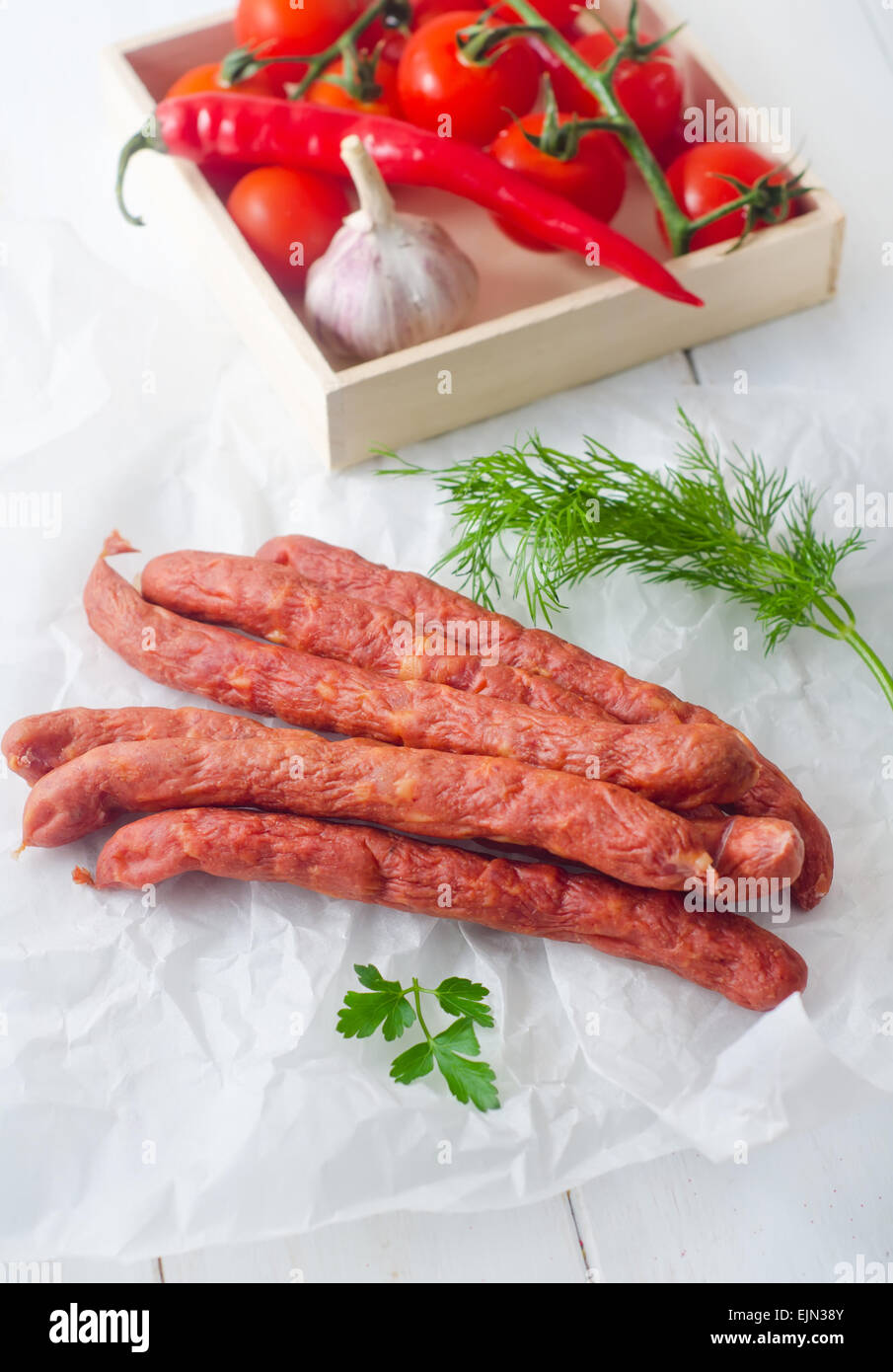 sausages in paper, vegetables in the box Stock Photo - Alamy