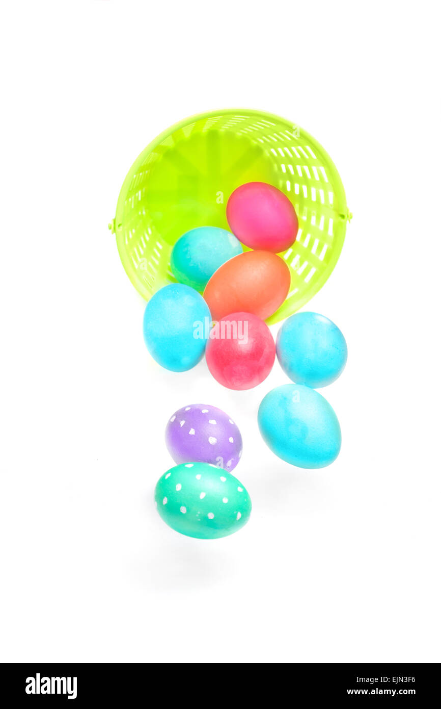 Easter eggs falling out of basket isolated on white (with shadow Stock ...