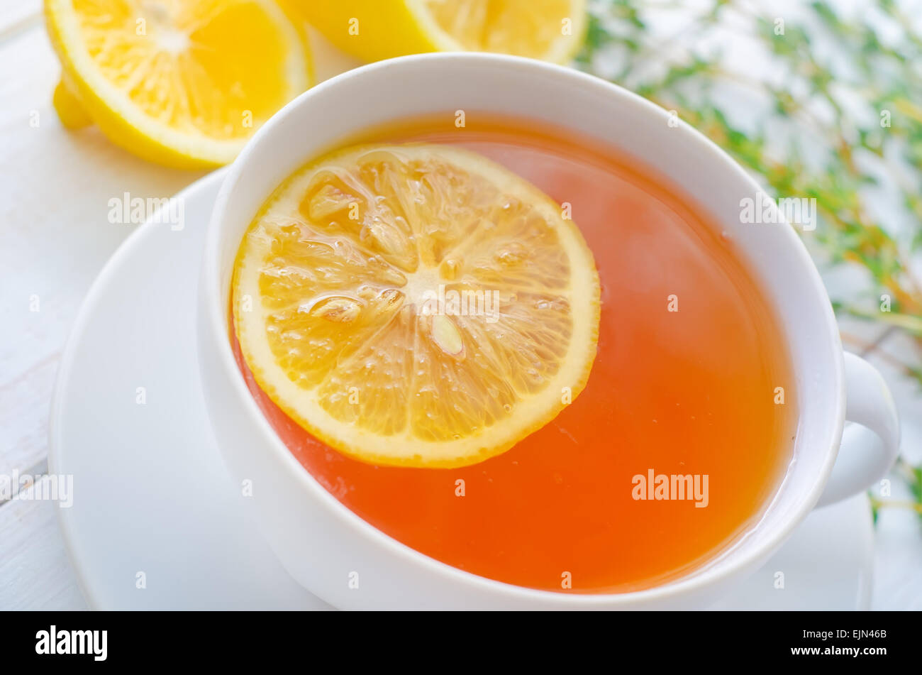 Fresh tea with lemon in the white cup Stock Photo - Alamy