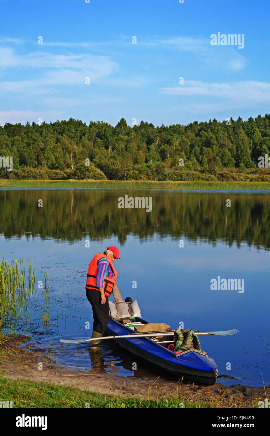 Woman boat beautiful meditation lake hi-res stock photography and ...