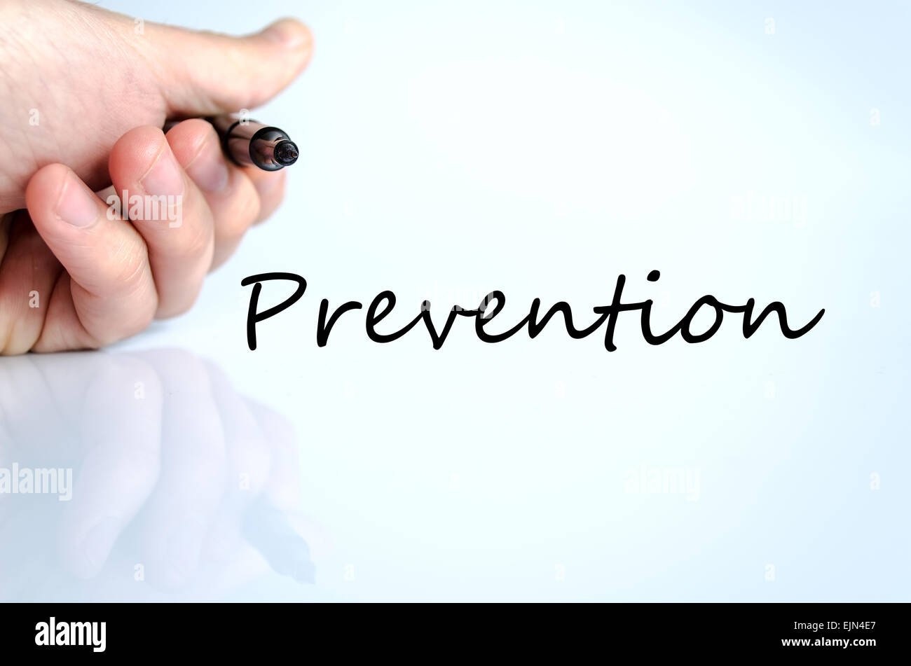 Human hand writing Prevention isolated over white background - business ...