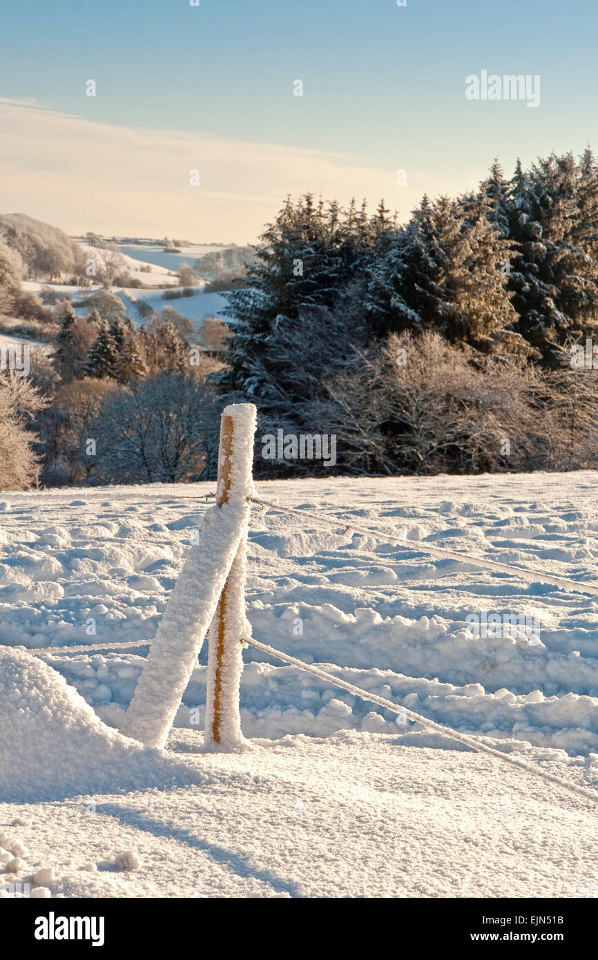 Fence post in the snow neat the Lake at Solbjerg, Denmark Stock Photo ...