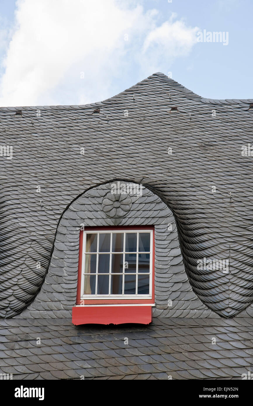 Slated roof with red and white window. Shot from Timmerdorfer Strand ...