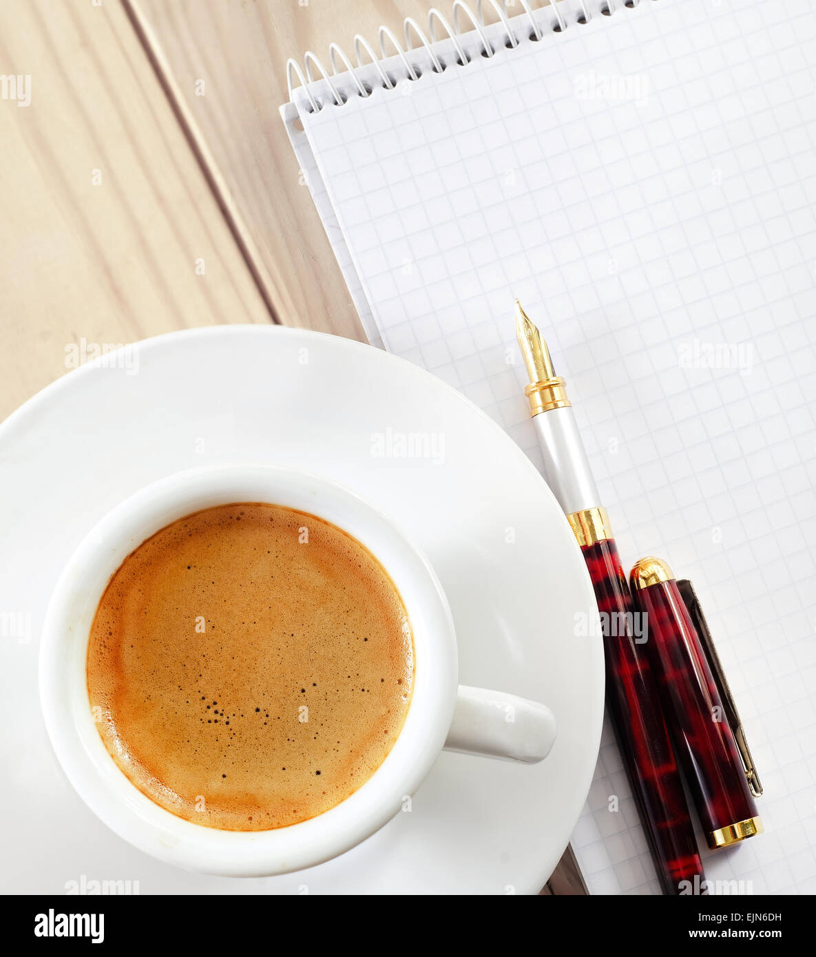 Coffee in the white cup and note Stock Photo - Alamy