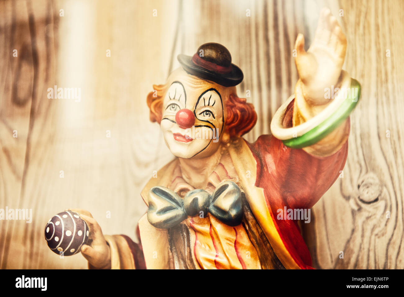 Beautiful handcrafted wooden Clown in shop window, toned image Stock ...