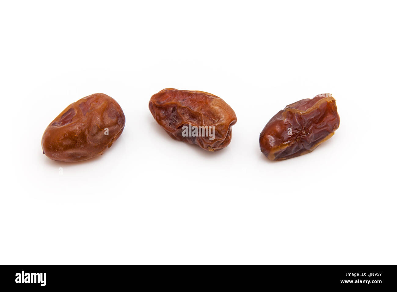 Halawi dates isolated on a white background. Halawi dates originate ...
