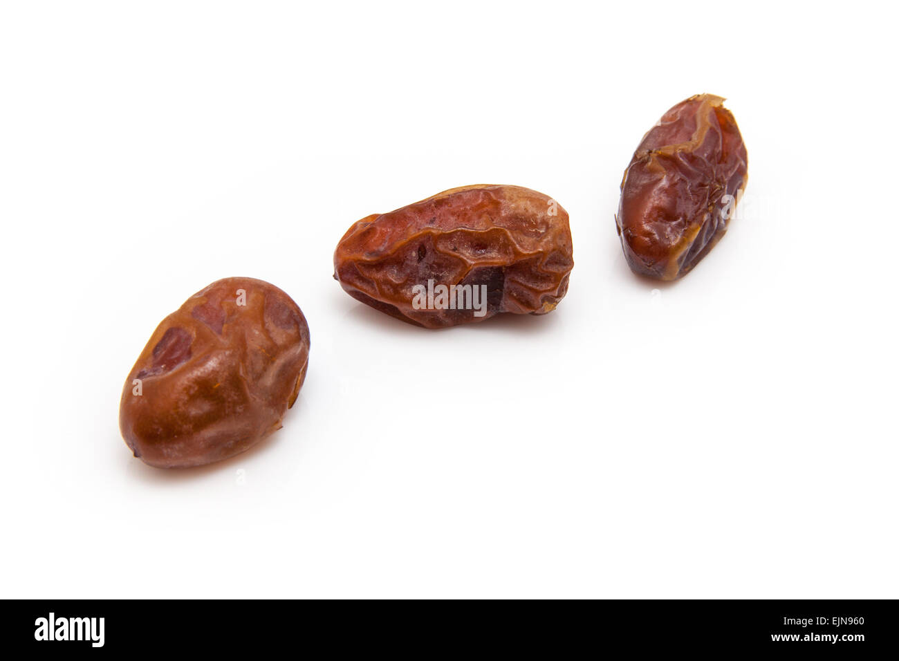Halawi dates isolated on a white background. Halawi dates originate ...