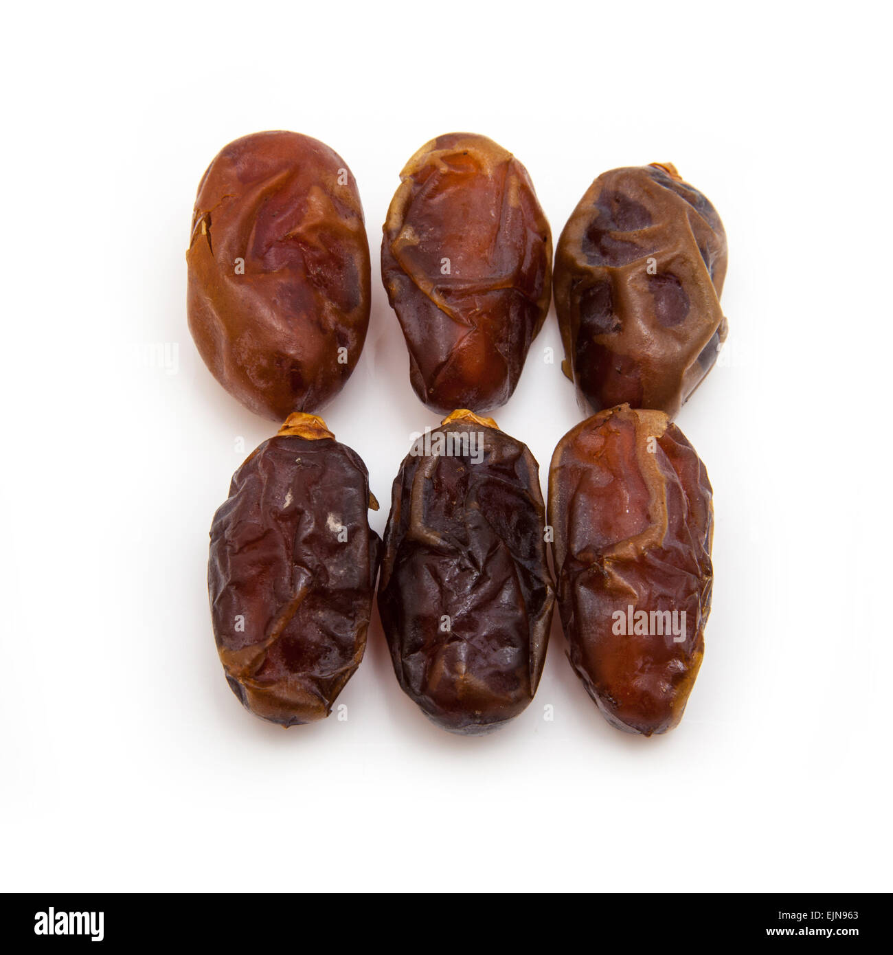 Halawi dates isolated on a white background. Halawi dates originate ...