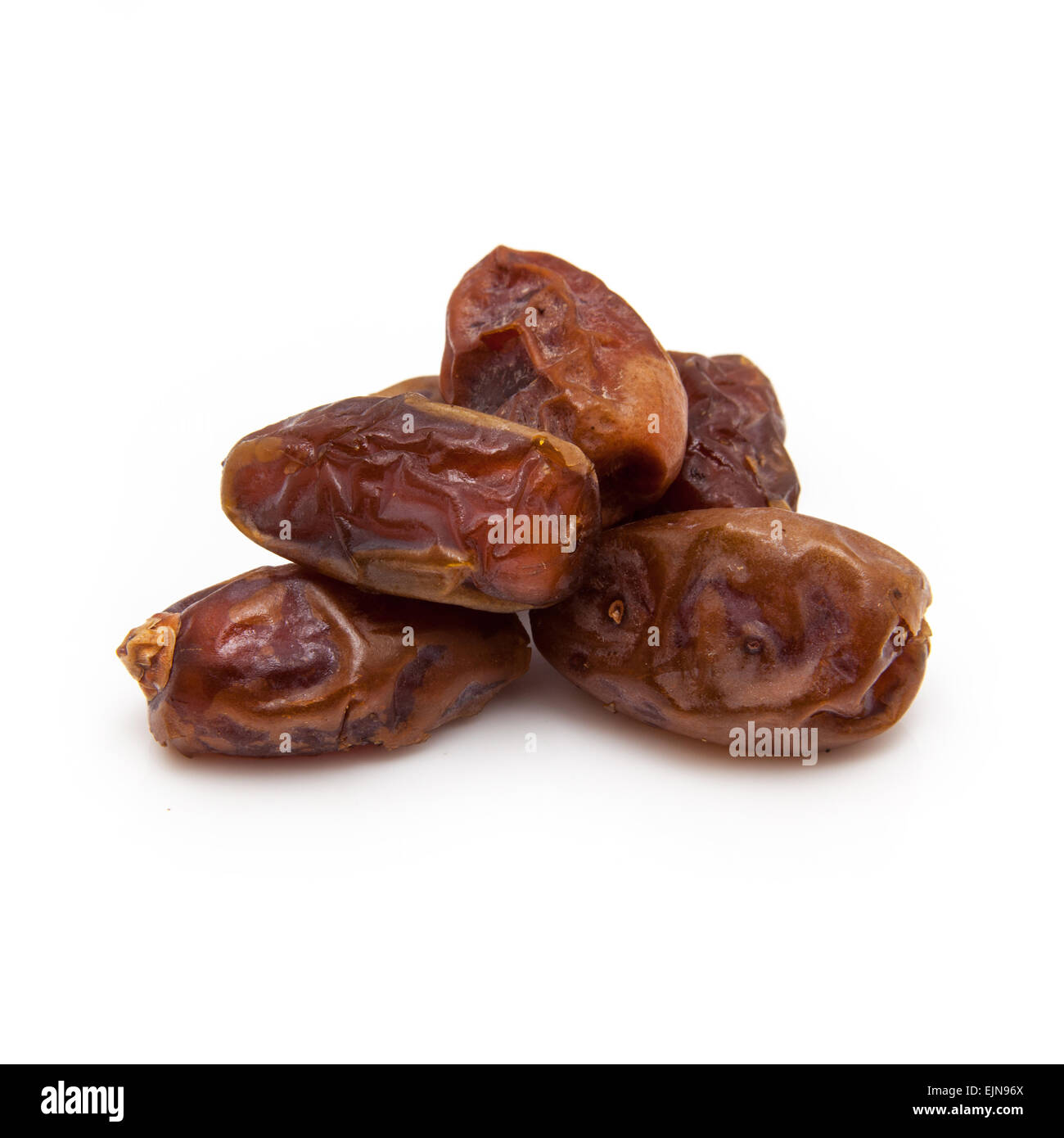 Halawi dates isolated on a white background. Halawi dates originate ...