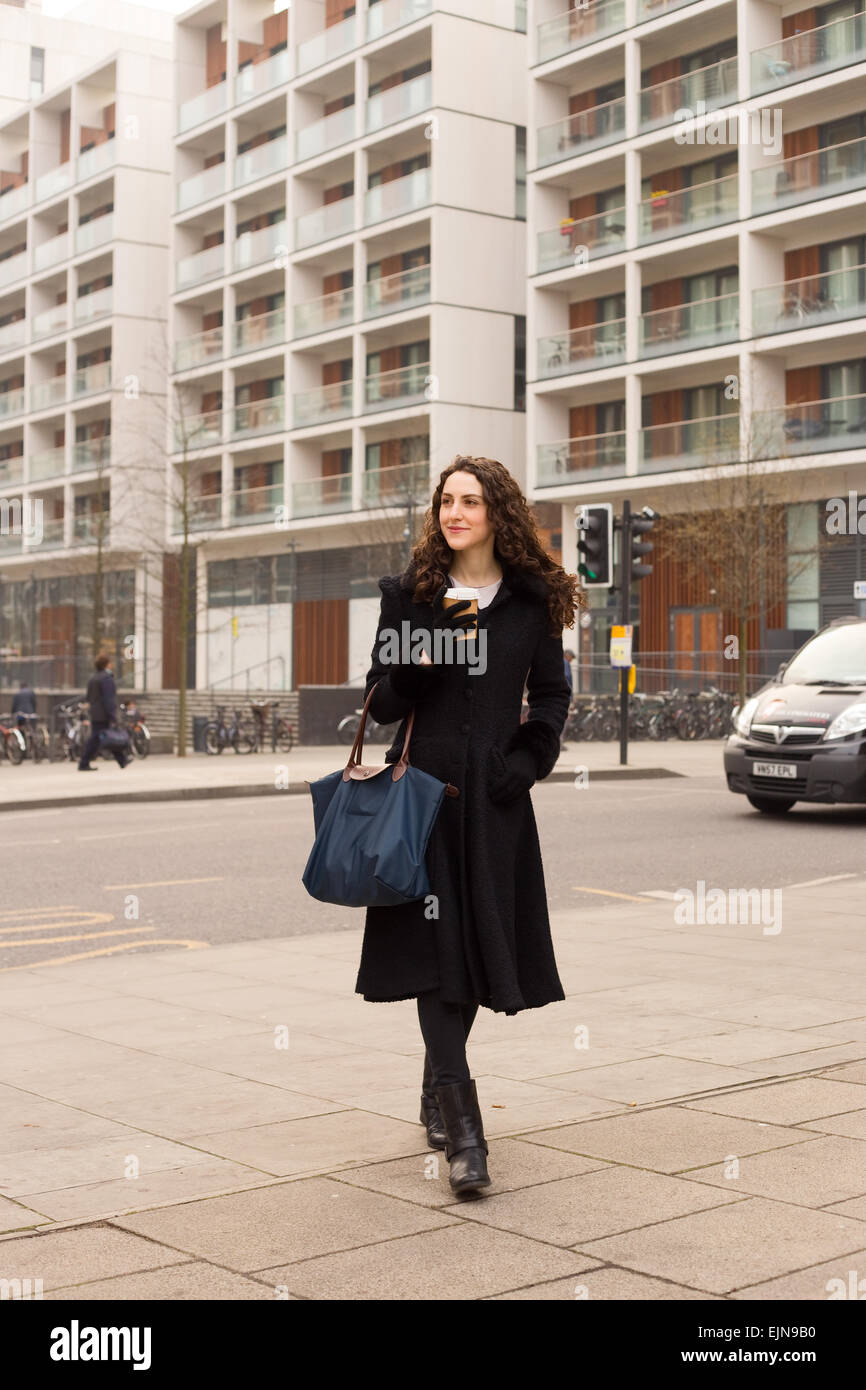 Beautiful woman walking street hi-res stock photography and images - Alamy