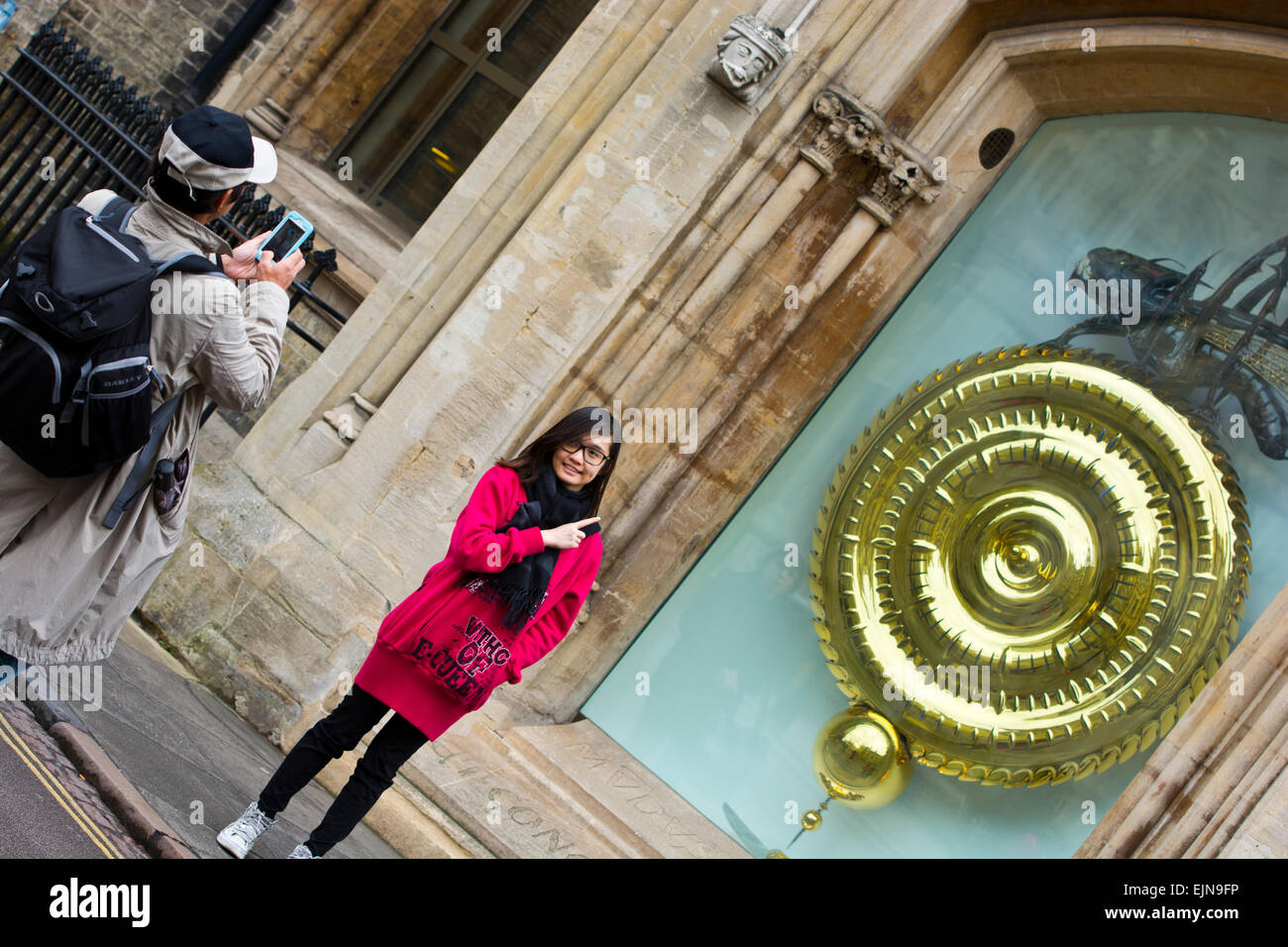 The Corpus Clock Cambridge with tourists Stock Photo - Alamy