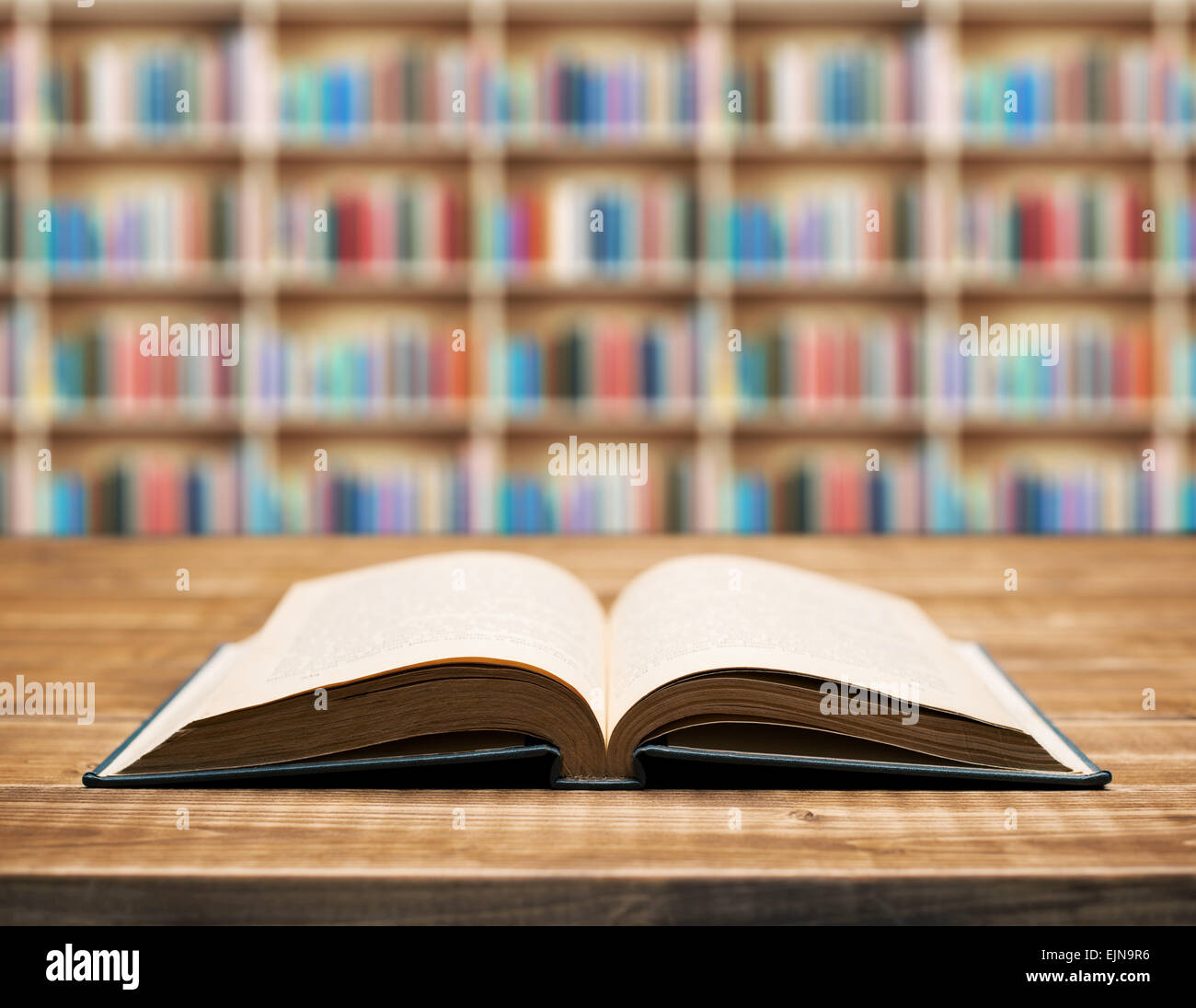 Open book on the table in shallow focus Stock Photo - Alamy
