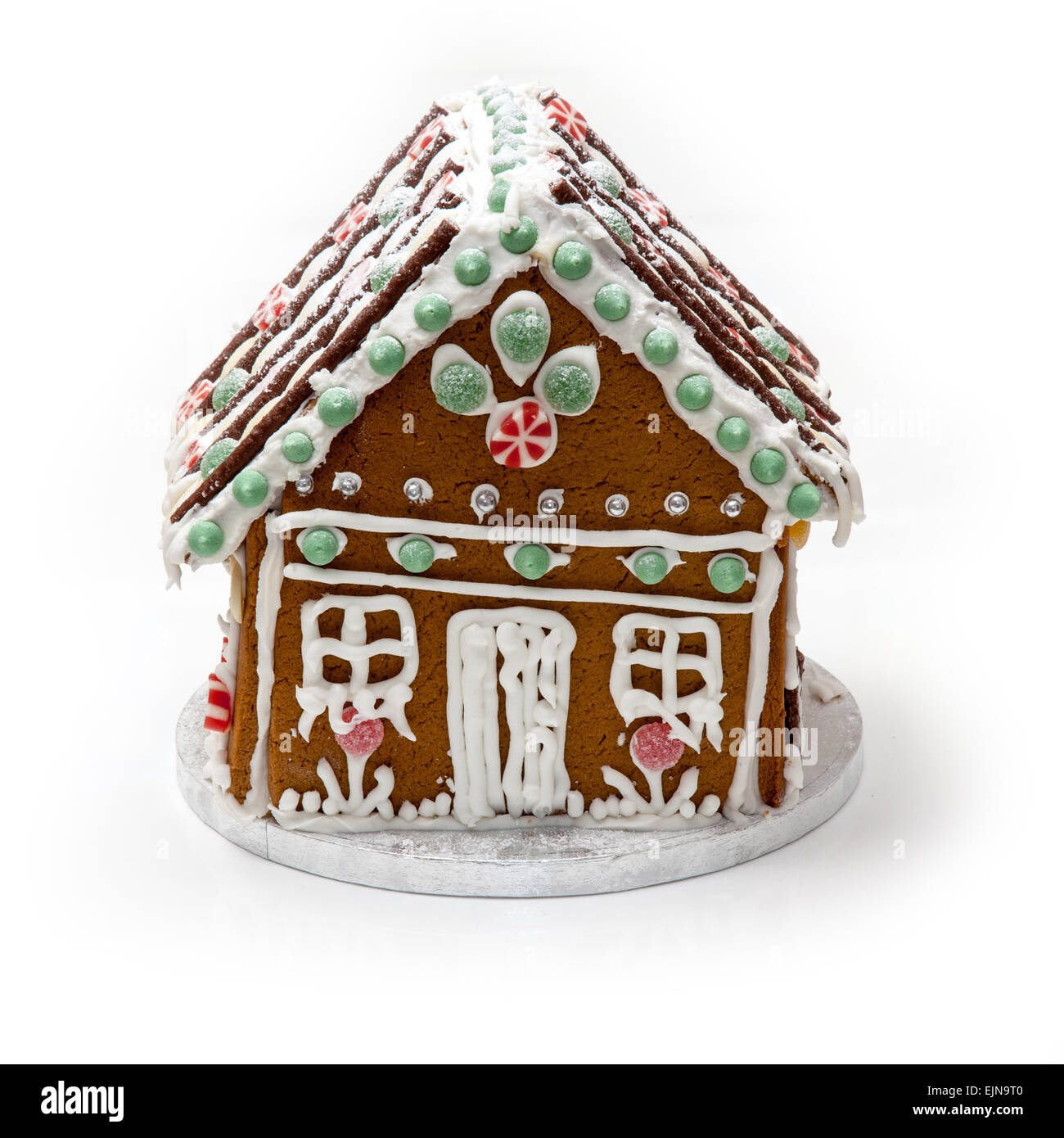 Traditional home made Ginger bread house isolated on a white studio ...
