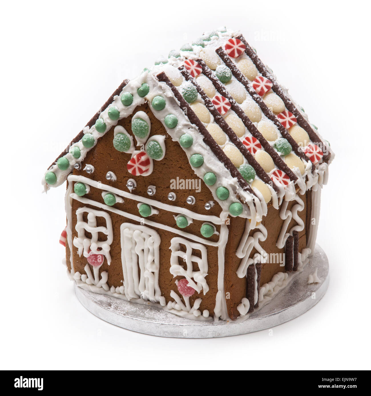 Traditional home made Ginger bread house isolated on a white studio ...