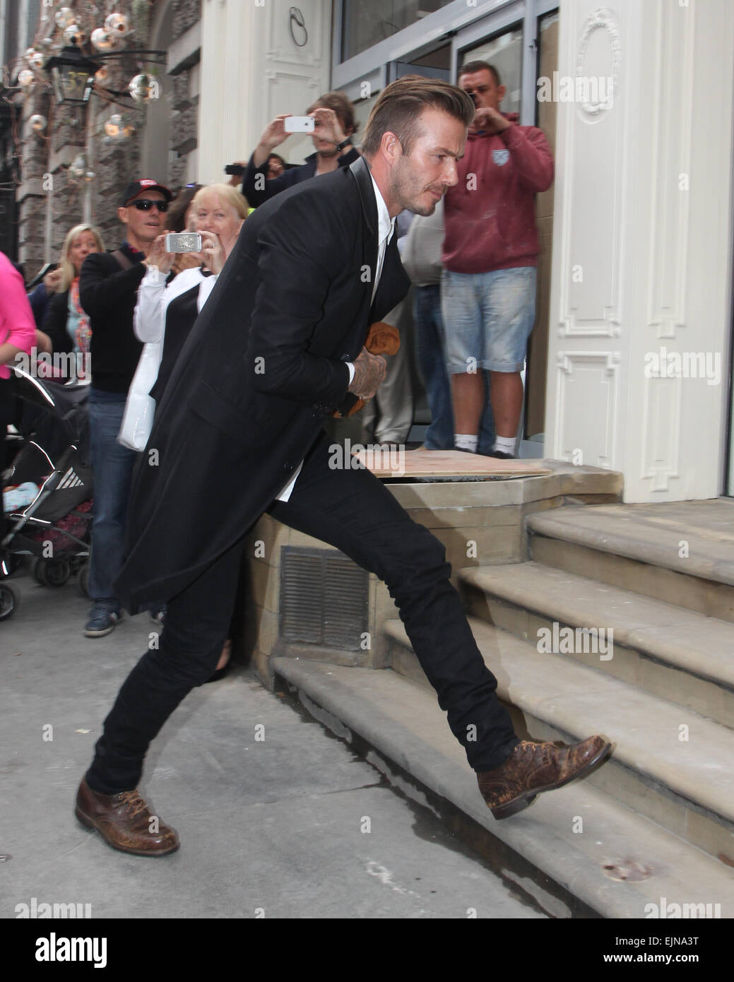 David Beckham arriving at Victoria Beckham's new store on Dover street ...