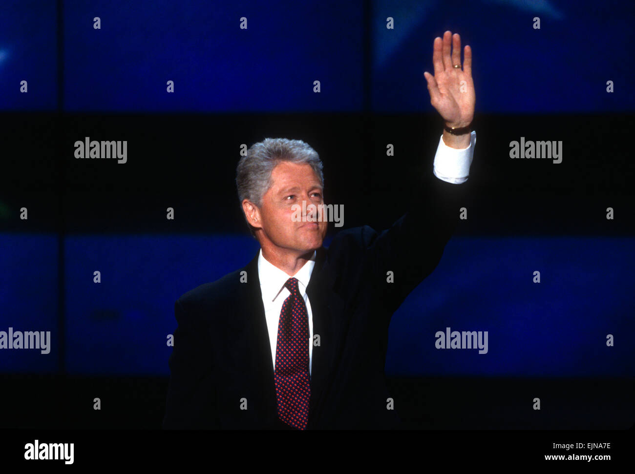 US President Bill Clinton waves to supporters as he accepts the ...