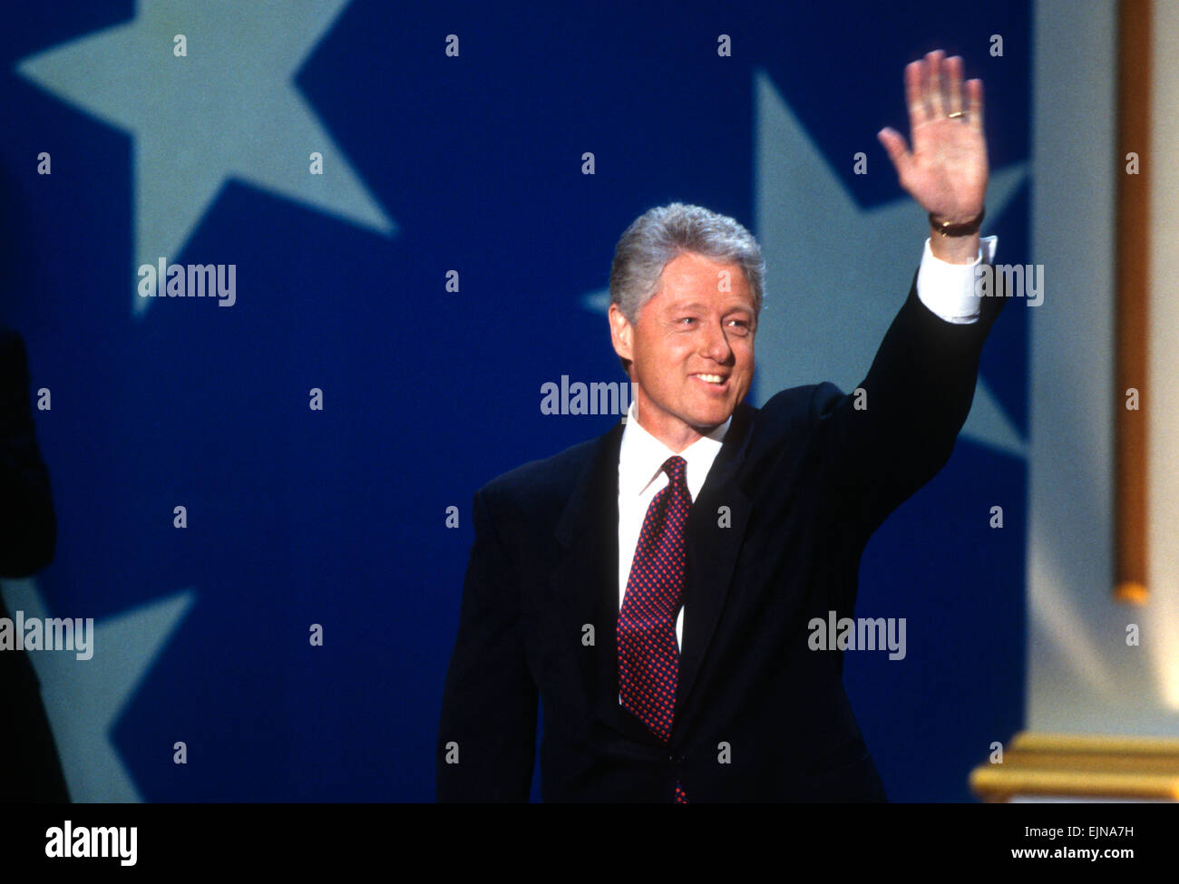 US President Bill Clinton waves to supporters as he accepts the ...