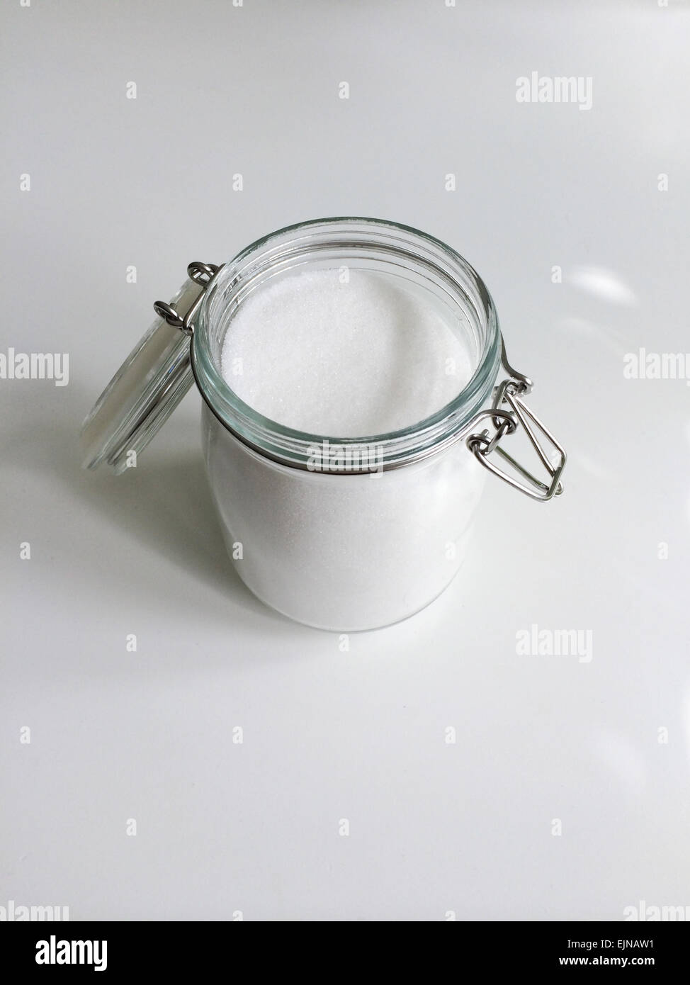 Open jar of refined granulated sugar Stock Photo - Alamy