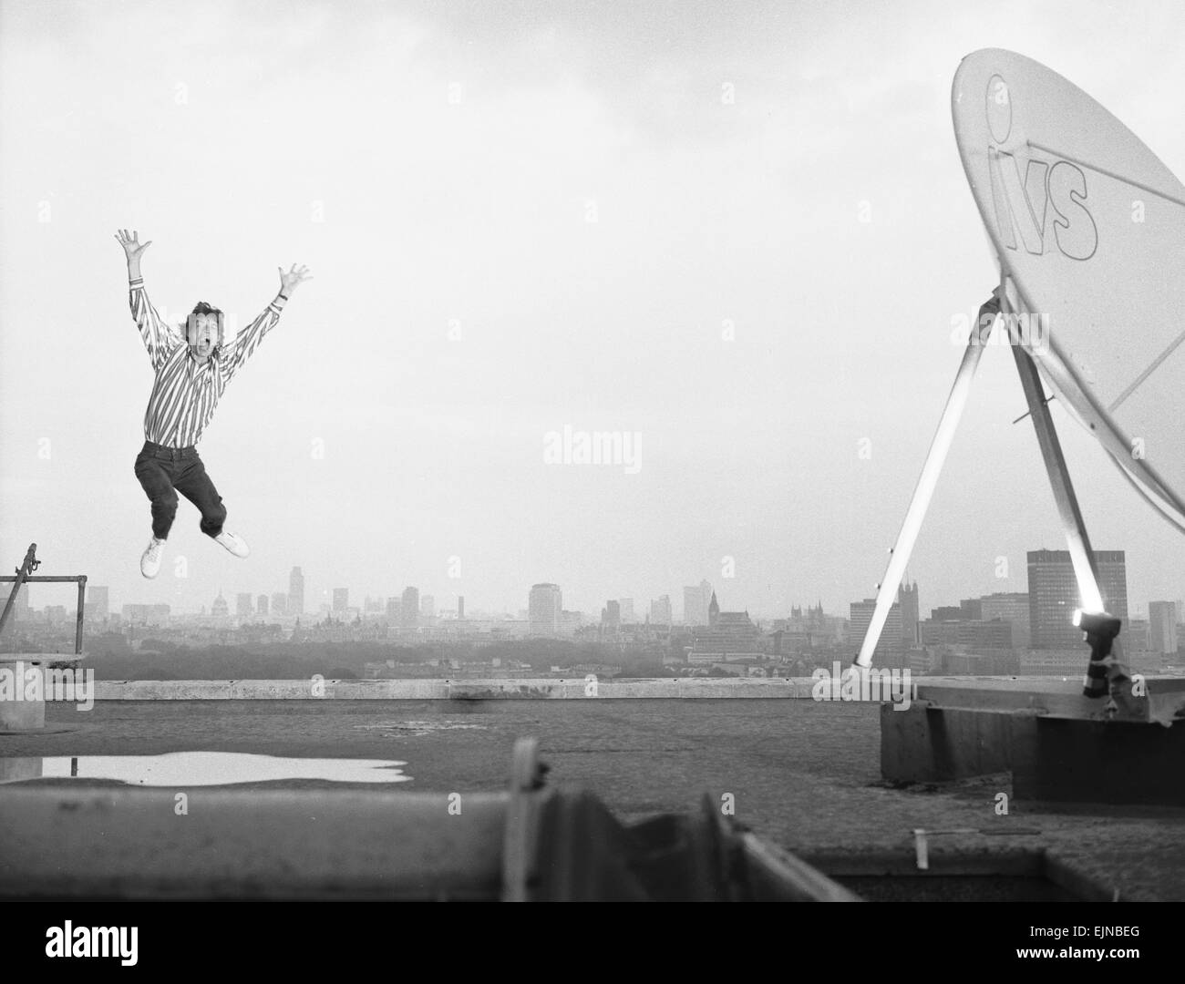 Rolling Stones: Mick Jagger on the roof of the Daily Mirror building in ...