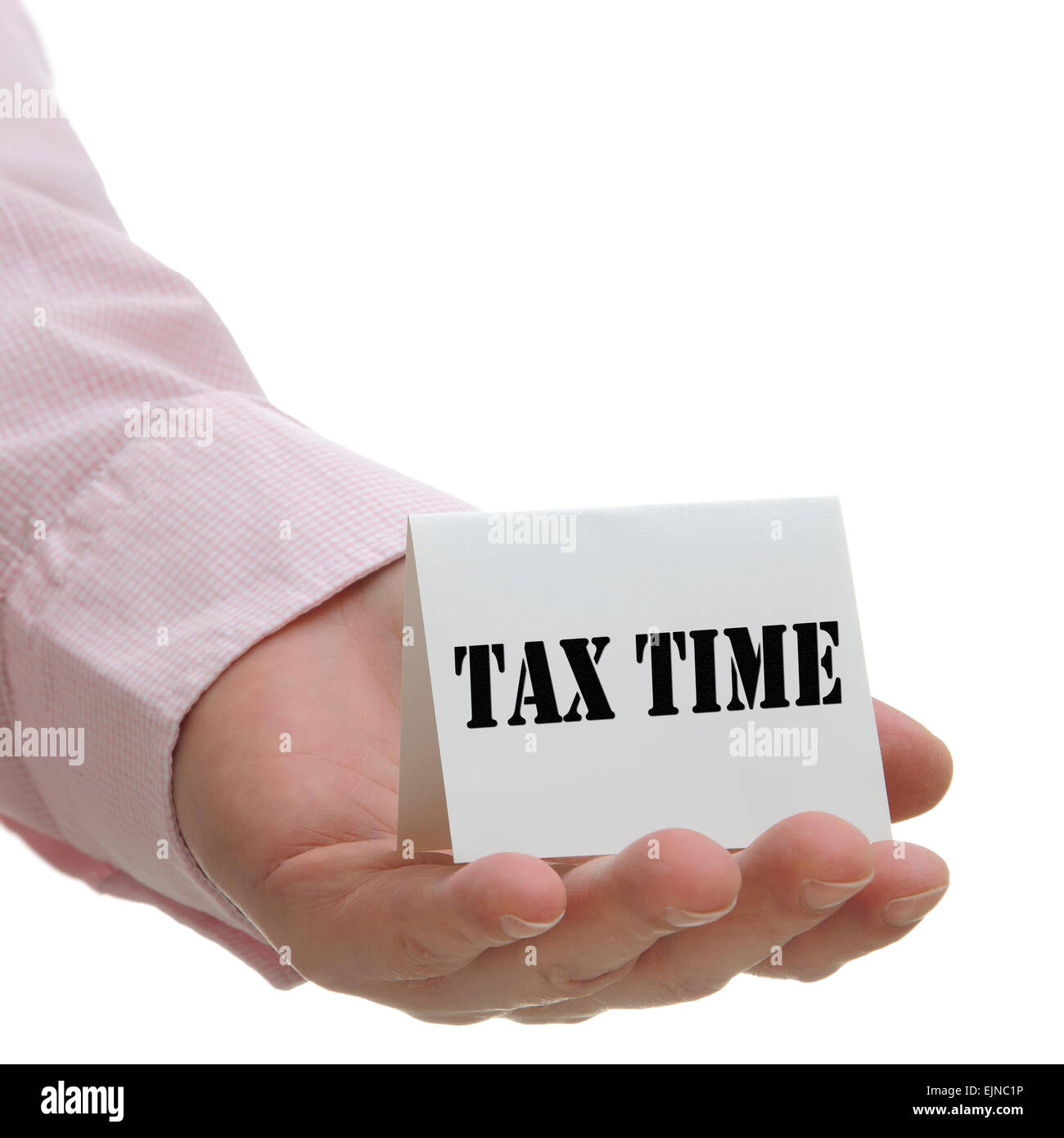 Business man holding tax time sign on hand Stock Photo - Alamy