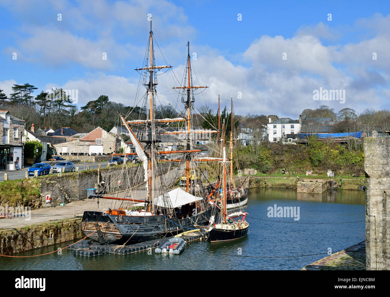 Old ships in the historic harbour at Charlestown, Cornwall, England, UK ...