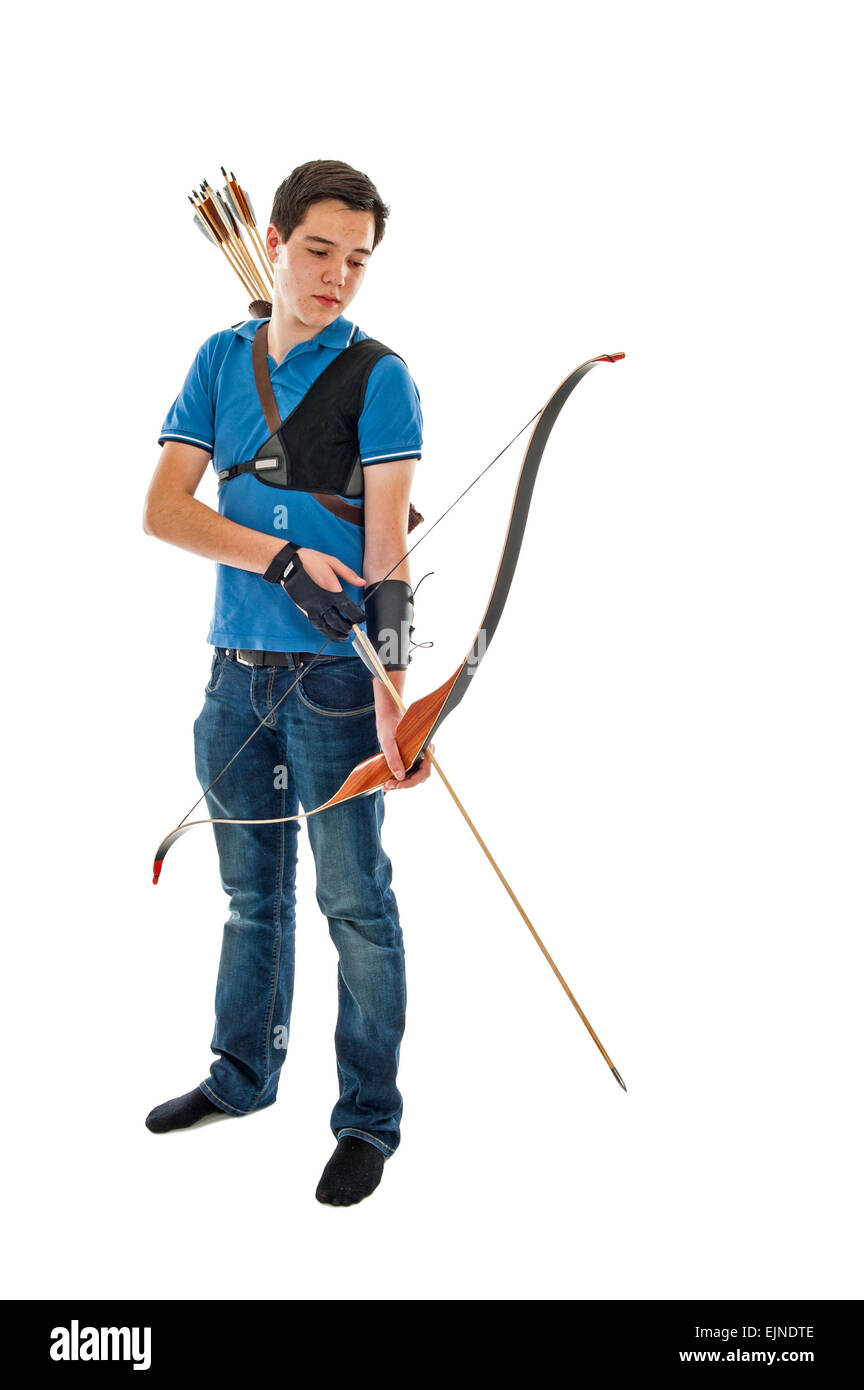 Boy with blue shirt and jeans holding a longbow Stock Photo - Alamy