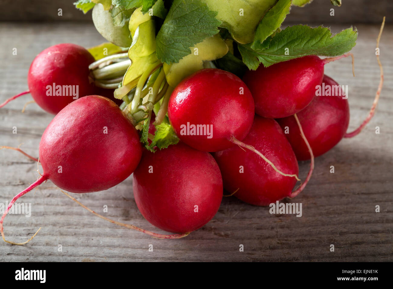 Fresh radish on table hi-res stock photography and images - Alamy
