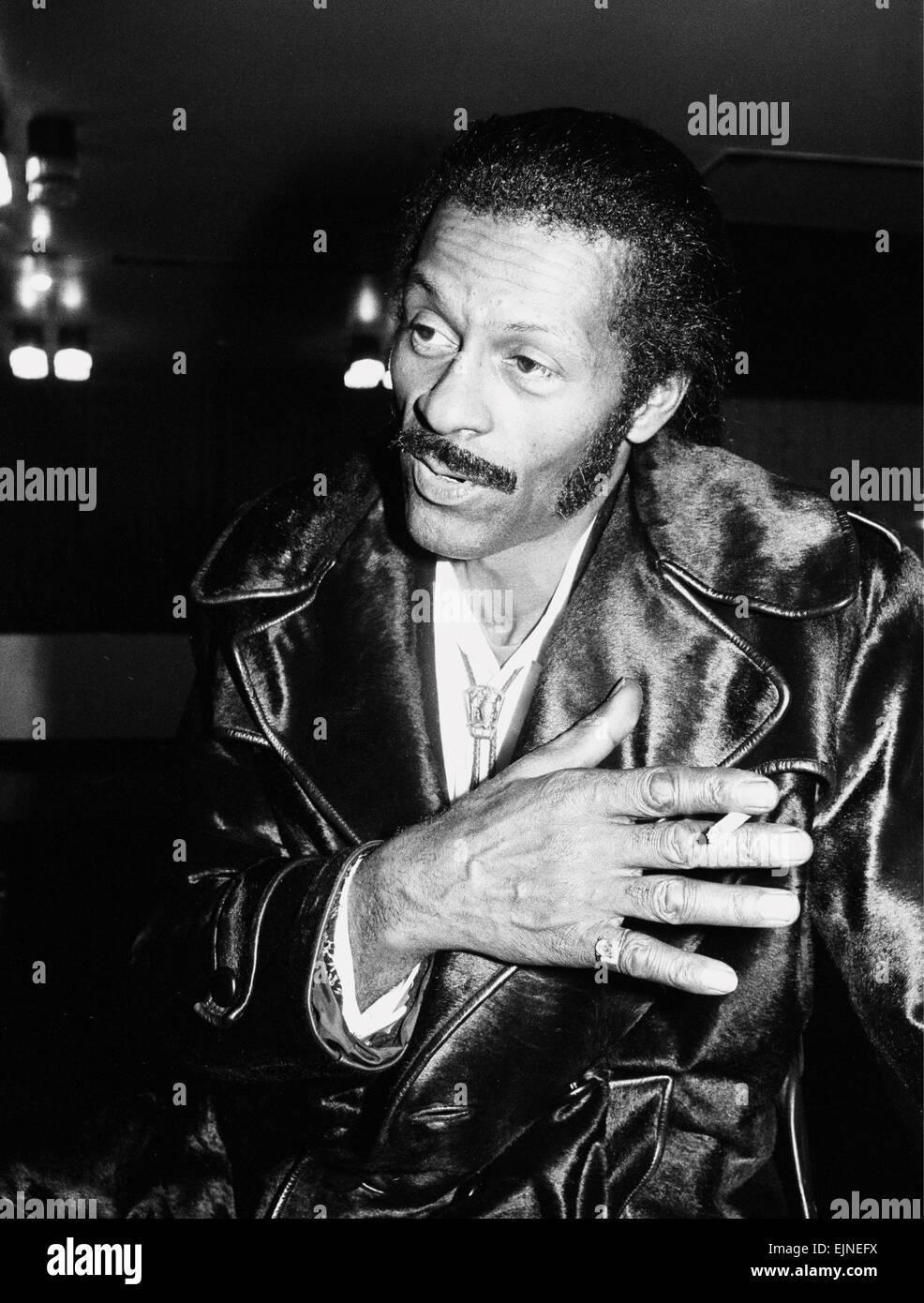American rock n roll singer Chuck Berry smoking a cigarette after a ...