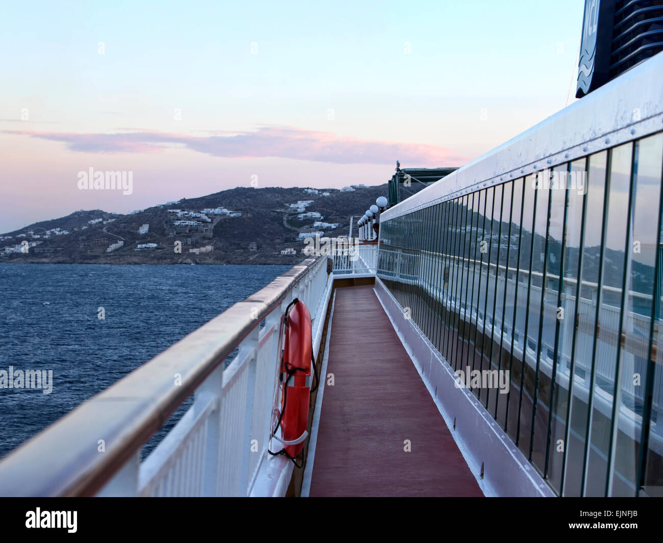 Mykonos, Greece from cruise ship deck sunset Stock Photo - Alamy