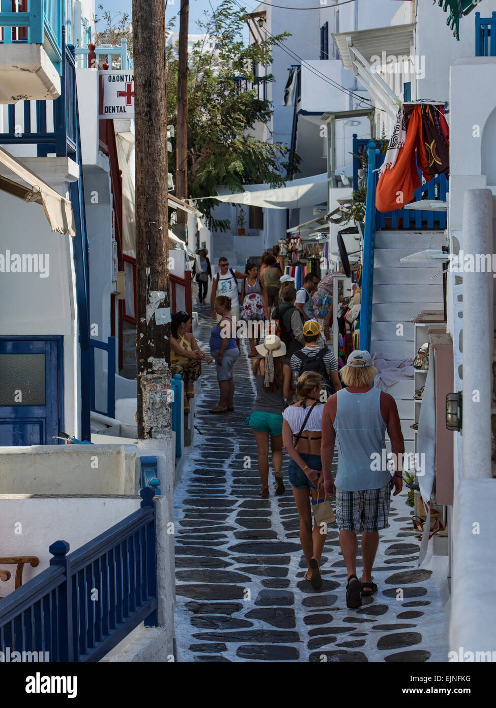 Mykonos, Greece tourists walk narrow business path Stock Photo - Alamy