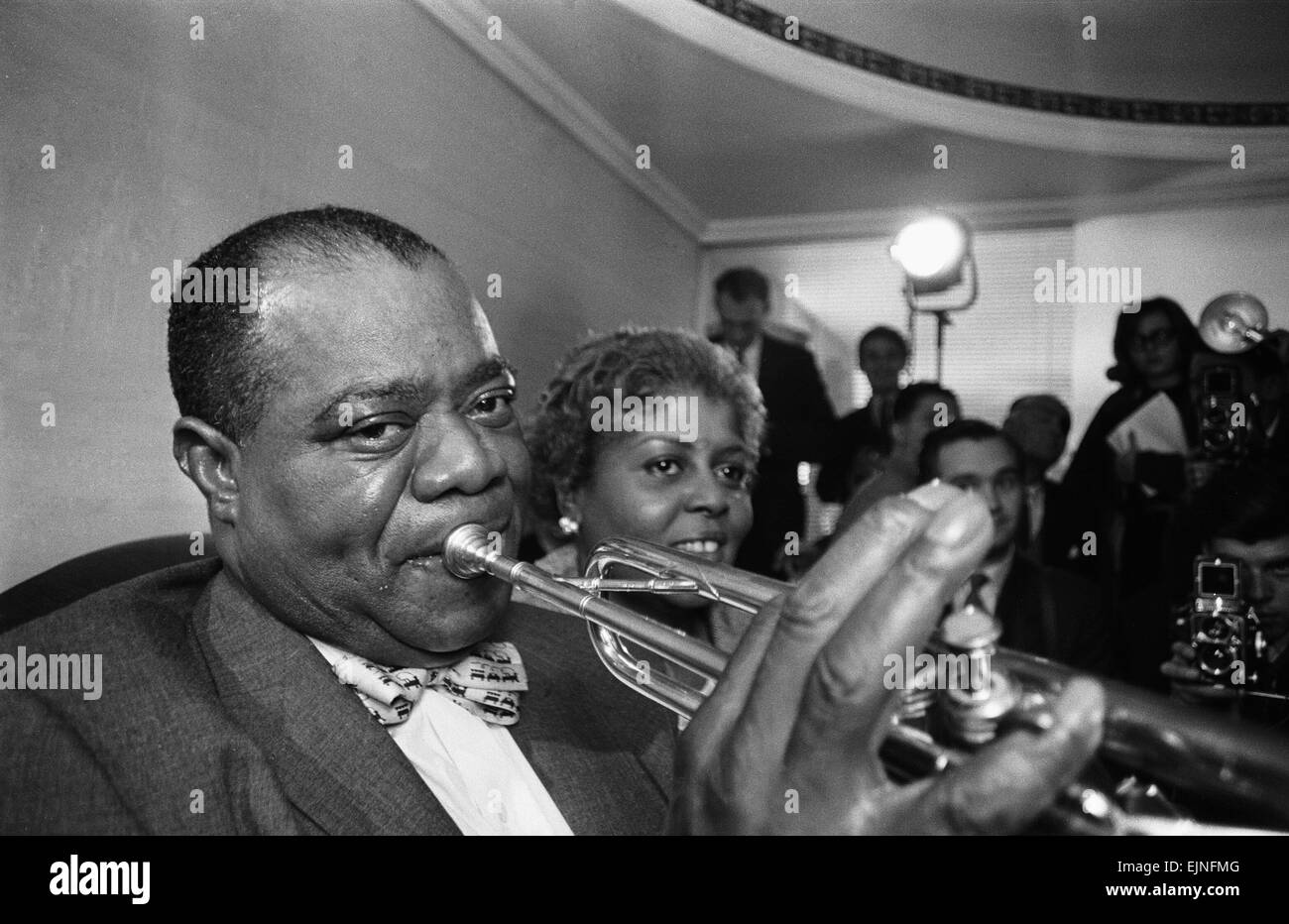 Louis Armstrong seen here giving a press conference at the Mayfair ...