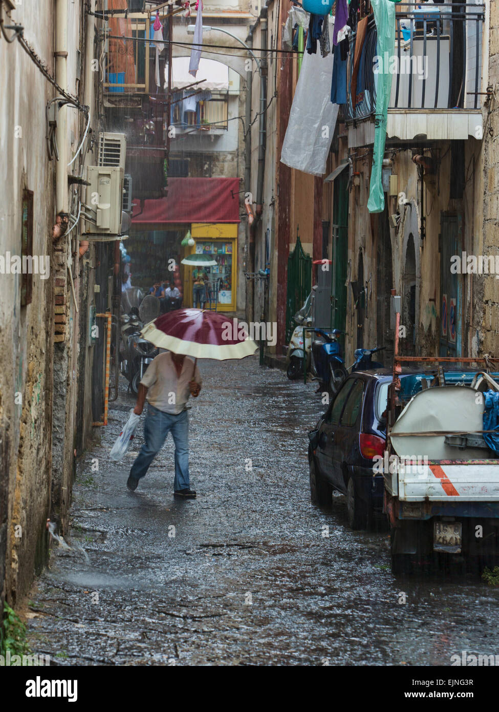 Naples, Italy rain thunderstorm narrow street Stock Photo - Alamy