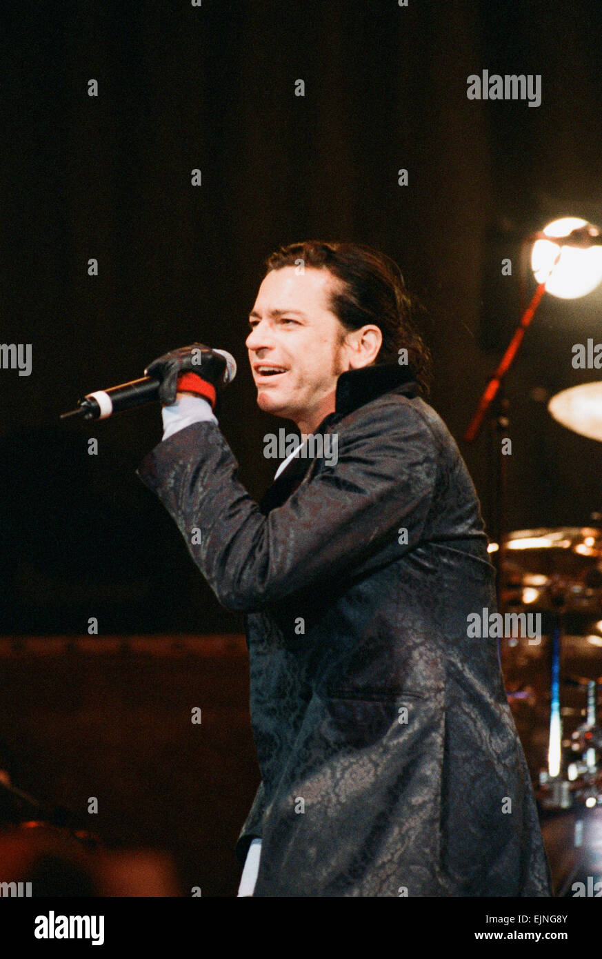 Michael Hutchence lead singer of INXS, pictured in concert - Elegantly ...