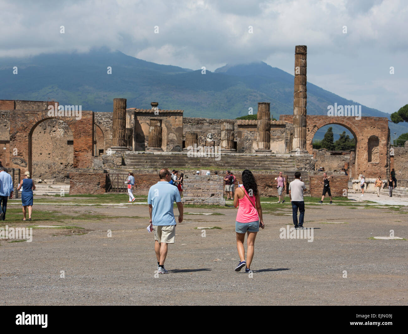 Pompeii, Naples, Italy ruins Mount Vesuvius couple walking Stock Photo ...