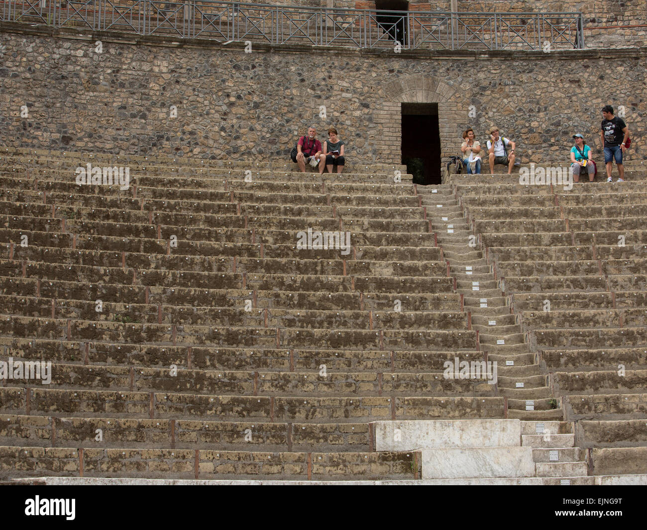 Pompeii, Naples, Italy steps and seats tourists amphitheater Stock ...