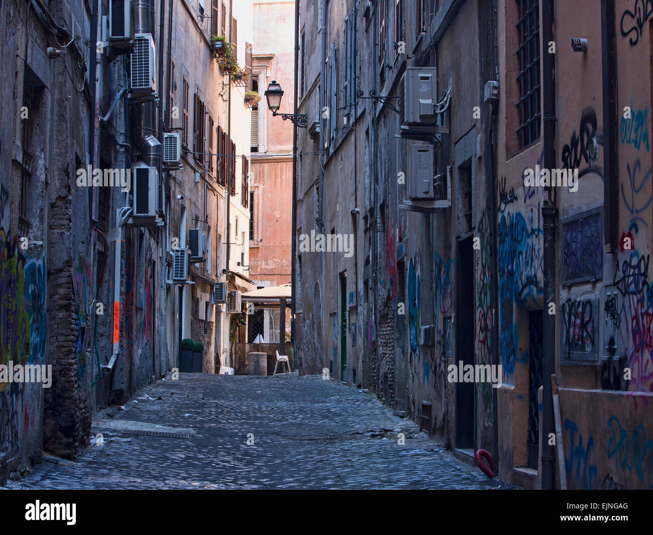 Rome, Italy alley narrow street graffiti Stock Photo - Alamy