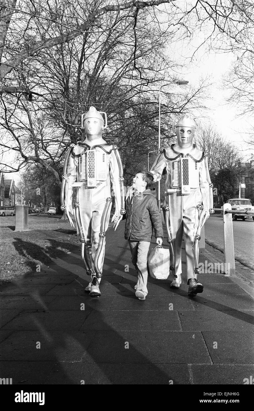 Cybermen take a break from filming at the BBC Ealing studios for Dr Who ...