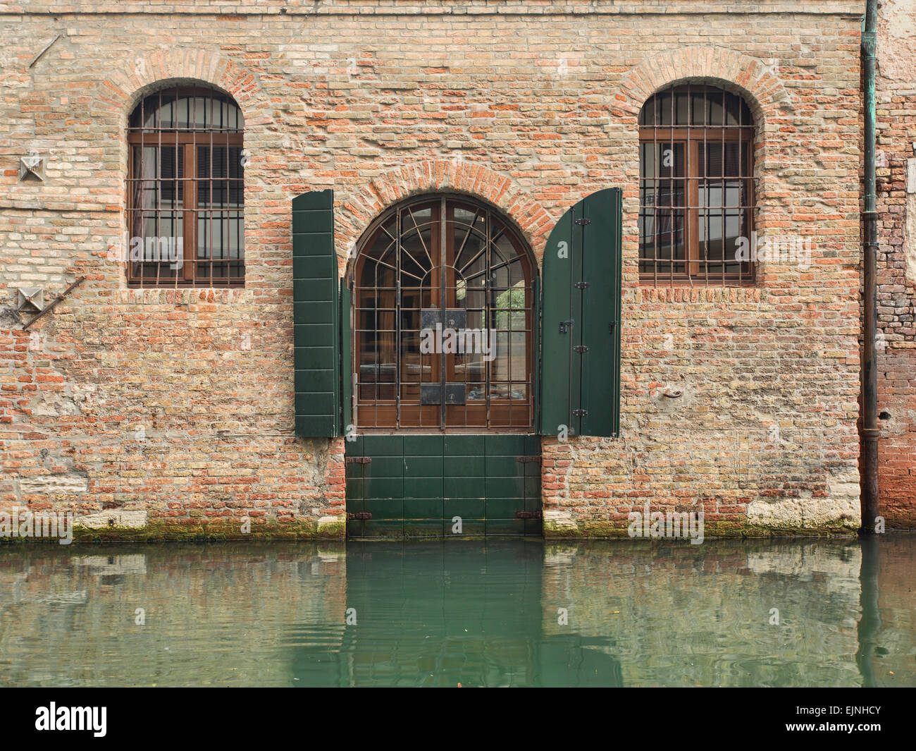 Venice, Italy door and windows at water level canal Stock Photo - Alamy