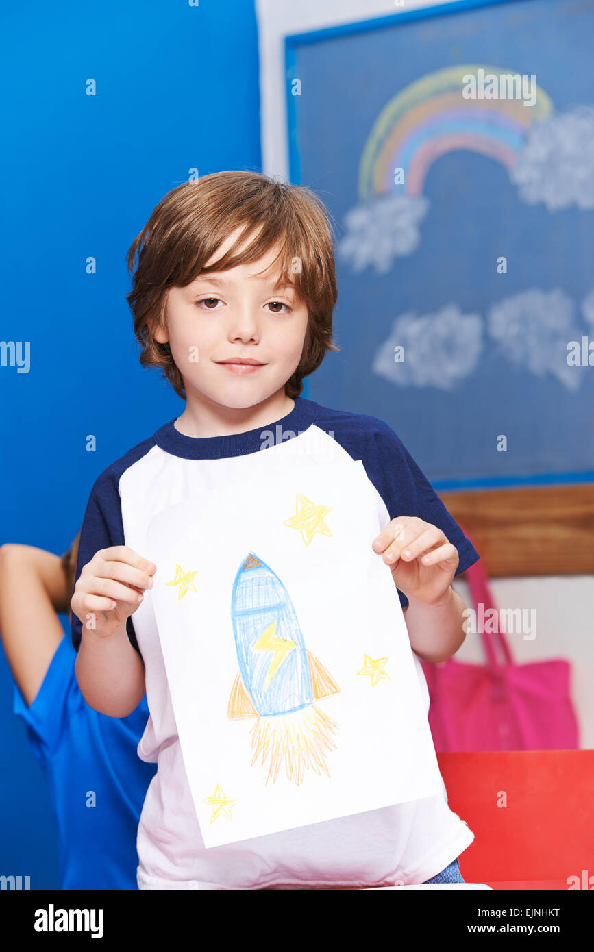Child showing drawing rocket in hi-res stock photography and images - Alamy