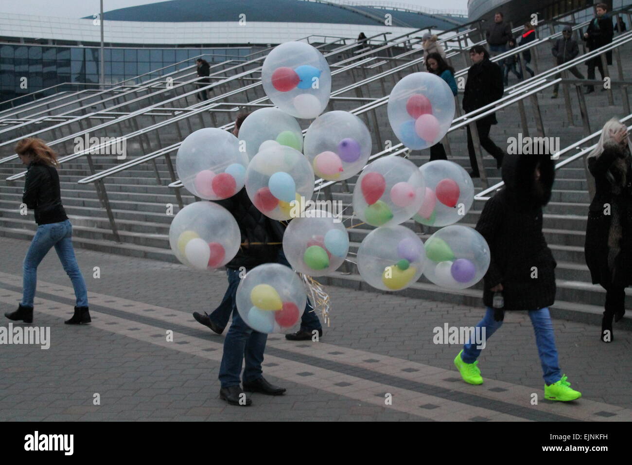 tuft of light balloon full of helium free fly on street Stock Photo - Alamy