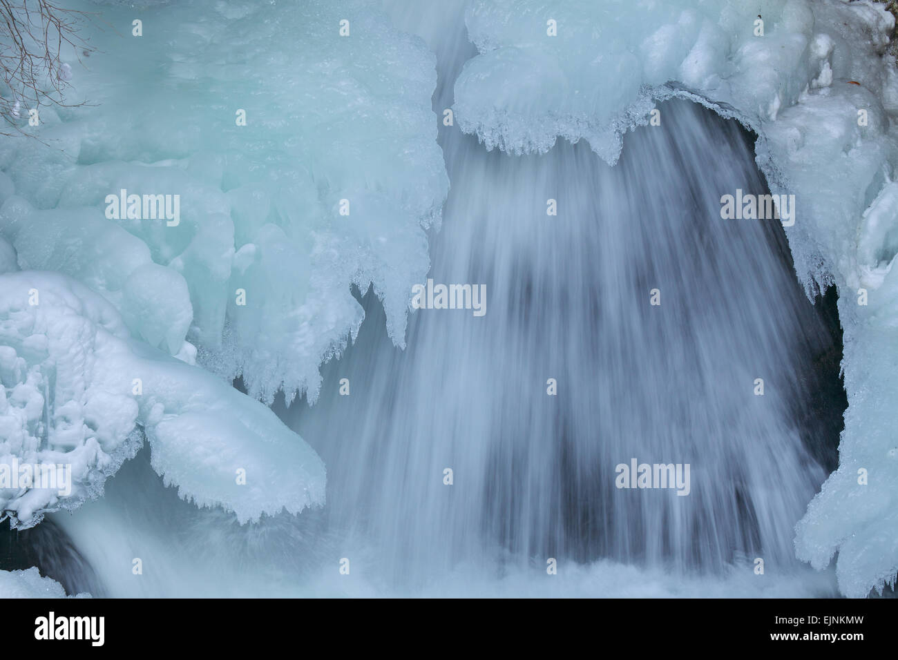 Ice and water stream Stock Photo - Alamy