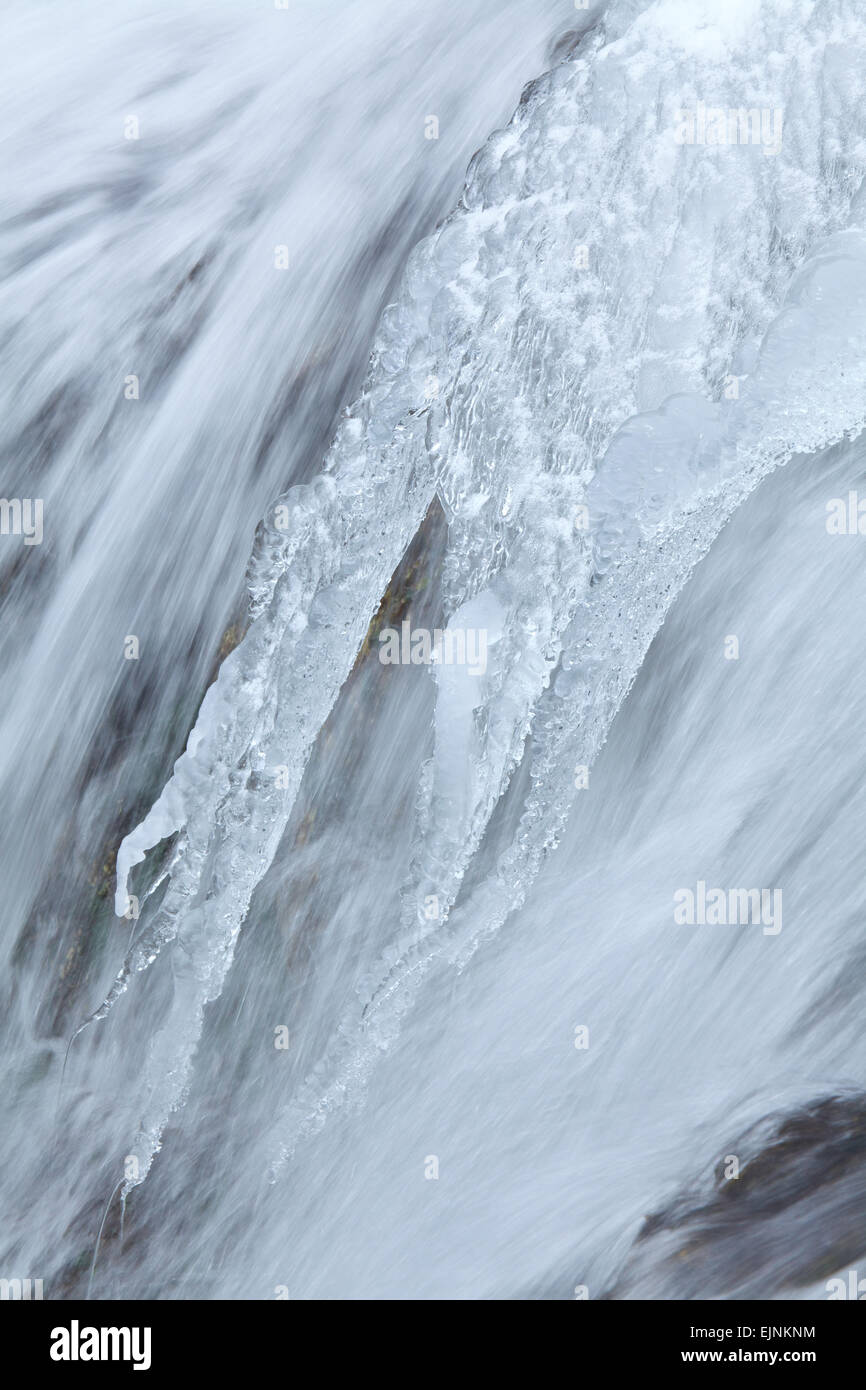 Ice and water stream Stock Photo - Alamy
