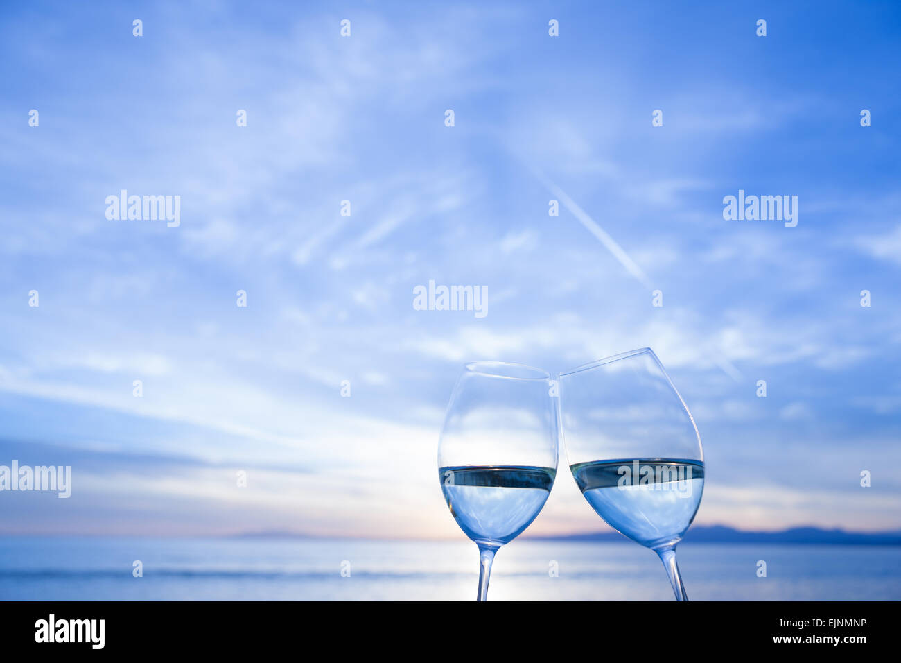 Toasting with wine Stock Photo - Alamy